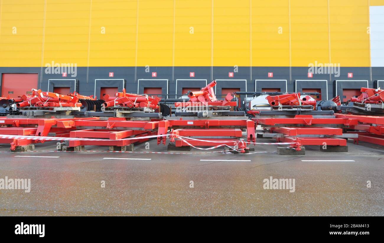 Storage of agricultural equipment in an open area of a warehouse ...