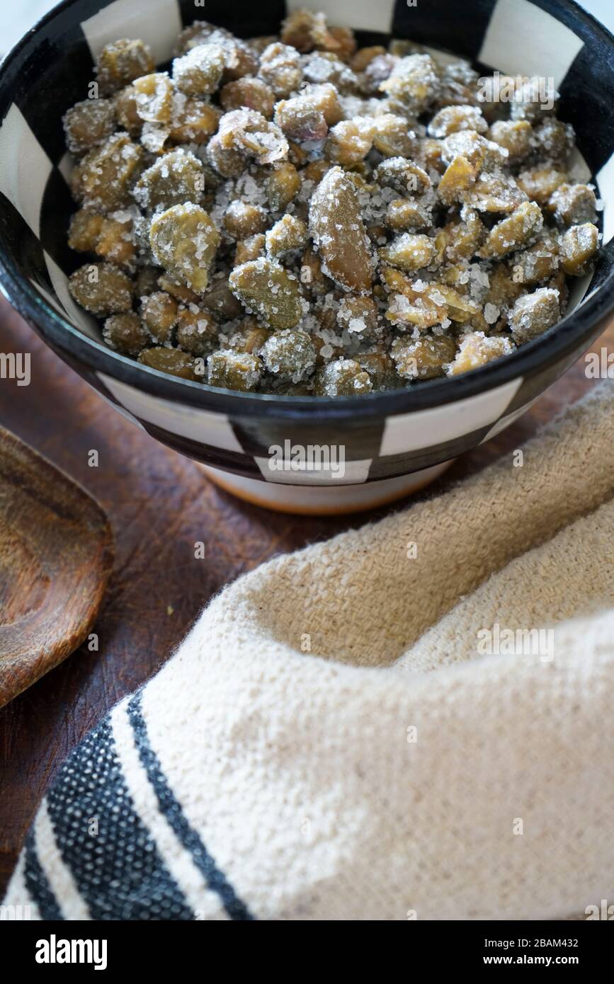Traditional capers preserved under salt from the Pantelleria Island, I ...