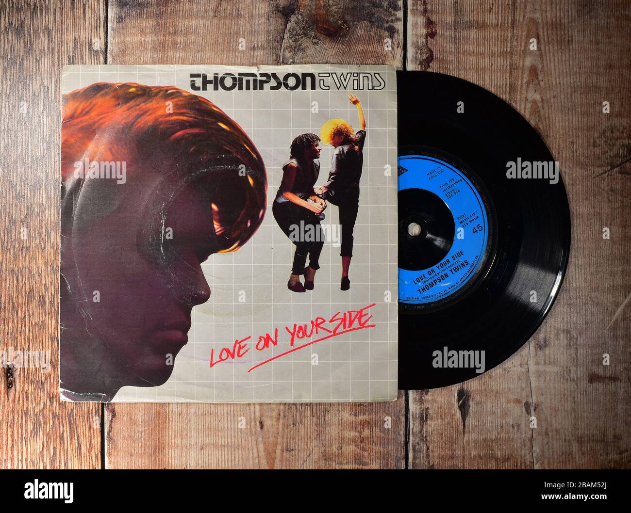 Thompson Twins - love on you side - 7 inch single Stock Photo - Alamy