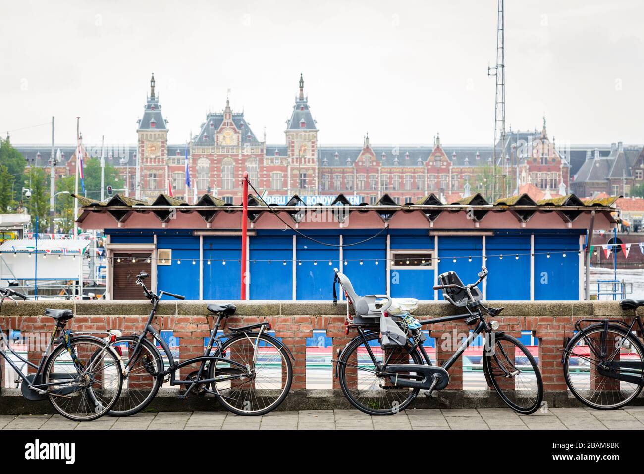 Classic Amsterdam symbol, various bikes parked in front of Amsterdam ...