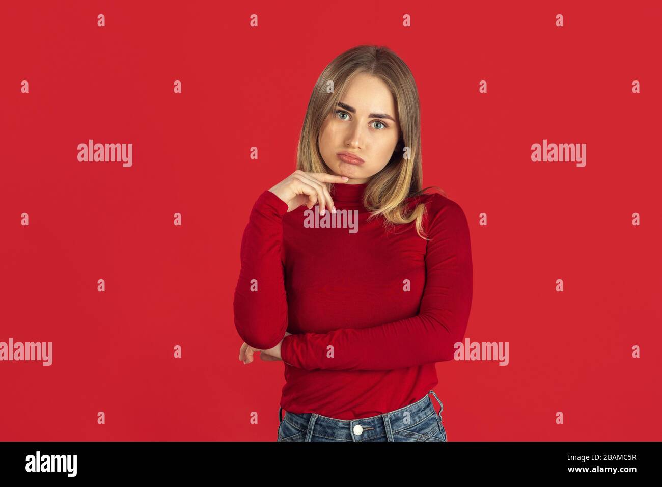 Blowing lips. Monochrome portrait of young caucasian blonde woman ...