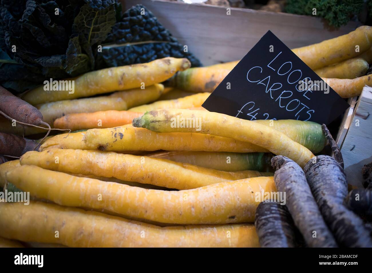 The fresh loose carrots for sale at the farmer market Stock Photo - Alamy