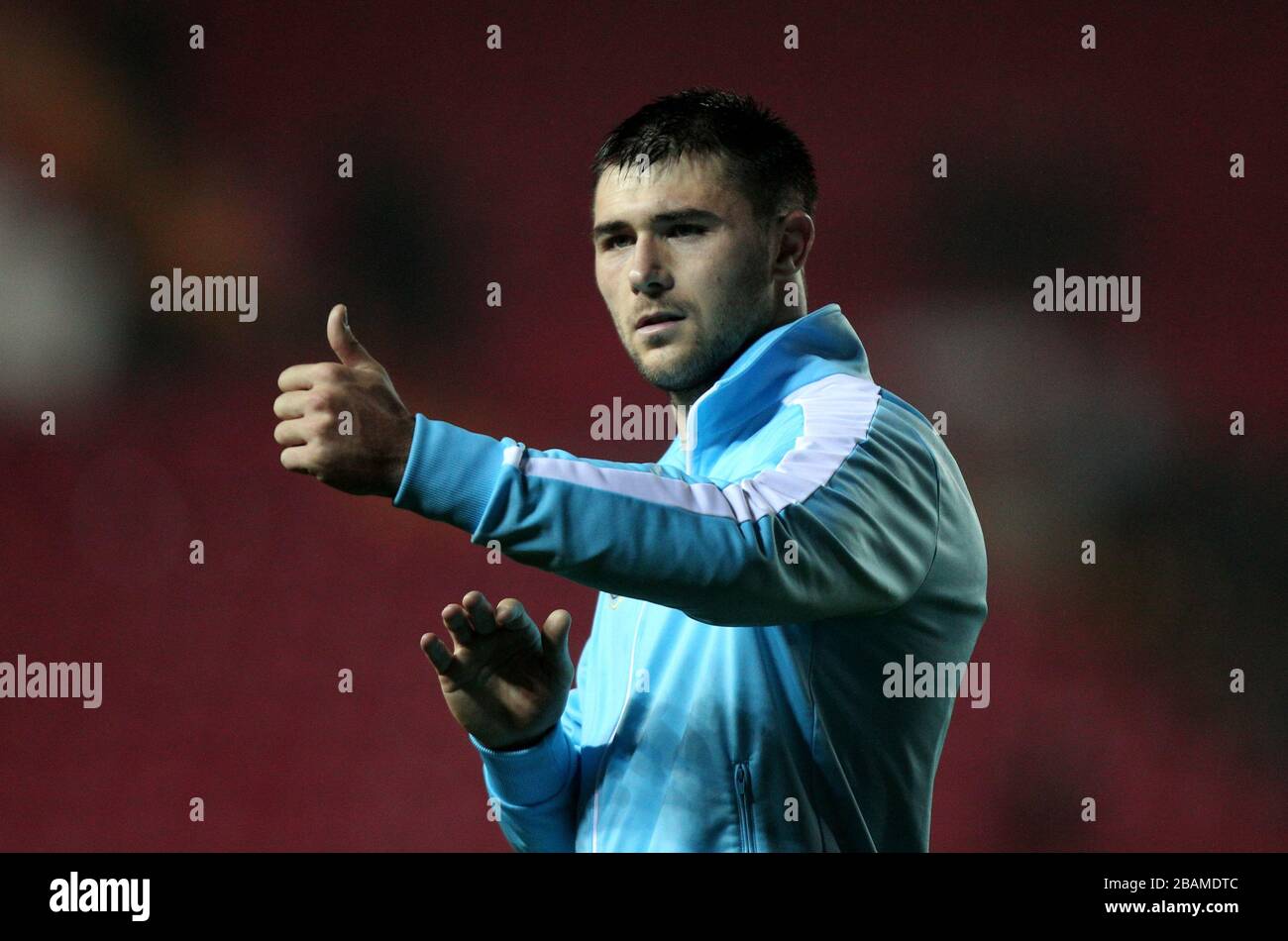 Burnley's Charlie Austin gives the fans a thumbs up sign after the end ...