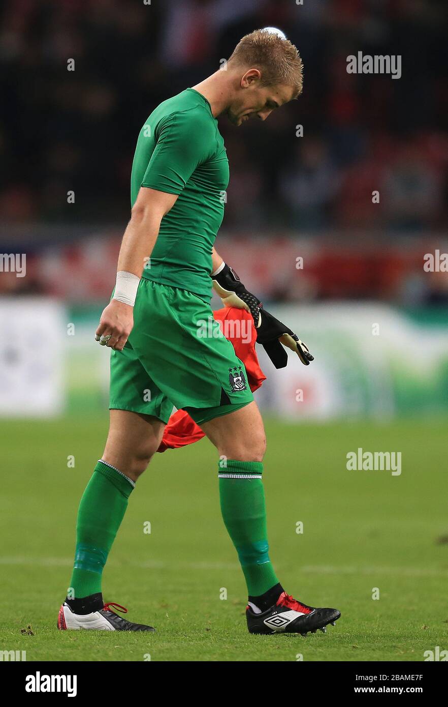 Manchester City's Joe Hart trudges off the pitch at the final whistle ...