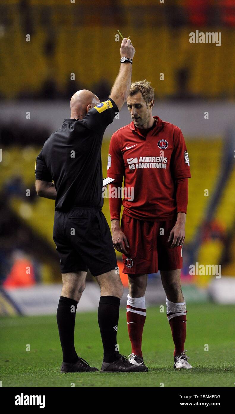 Rob Hulse (right) is booked by match referee Nigel Miller (left Stock ...