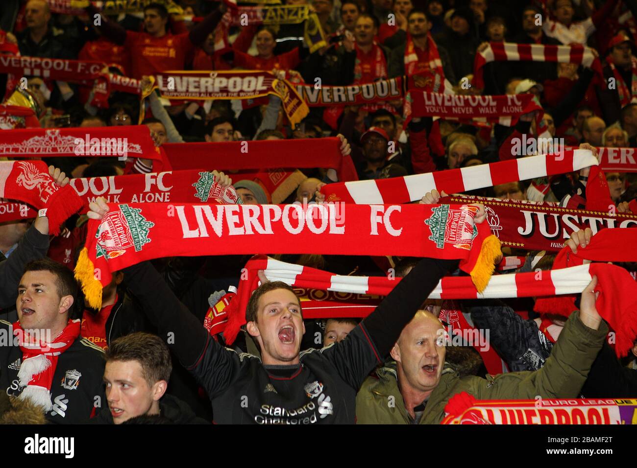 Liverpool fans in the stands Stock Photo - Alamy