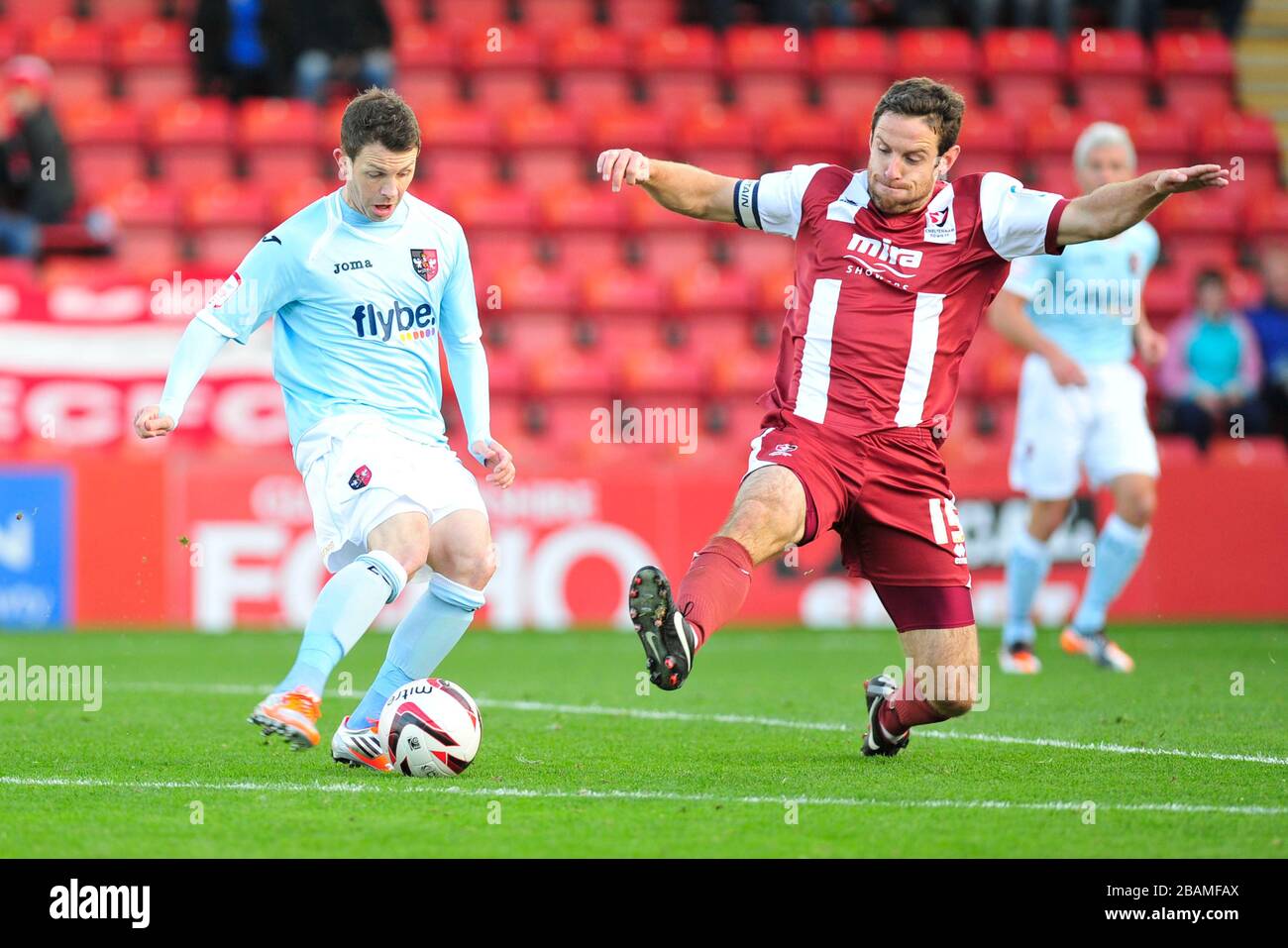 Cheltenham Town's Alan Bennett (right) and Exeter City's Jamie Cureton ...