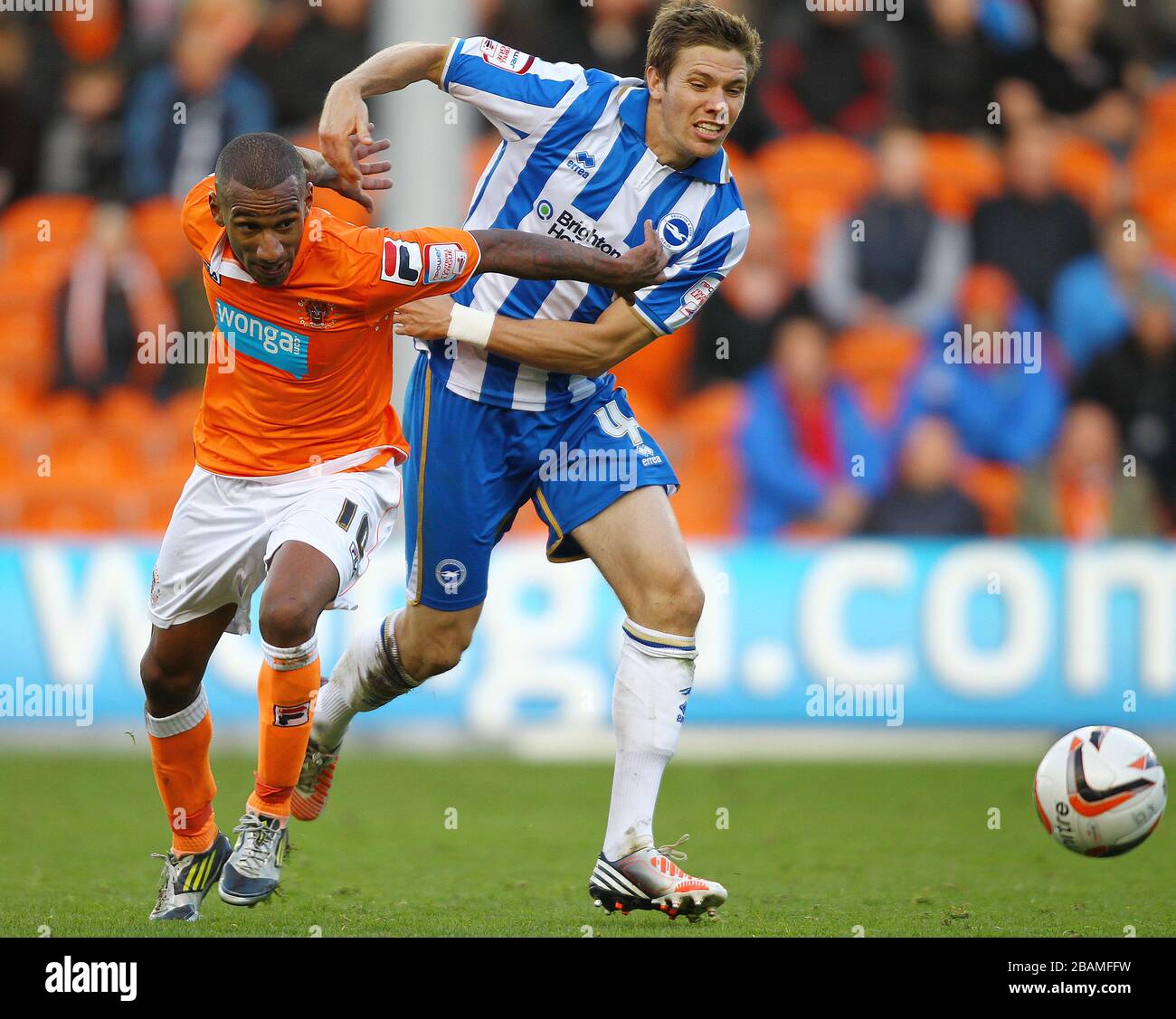 Blackpool's Elliott Grandin and Brighton & Hove Albion's Dean Hammond ...
