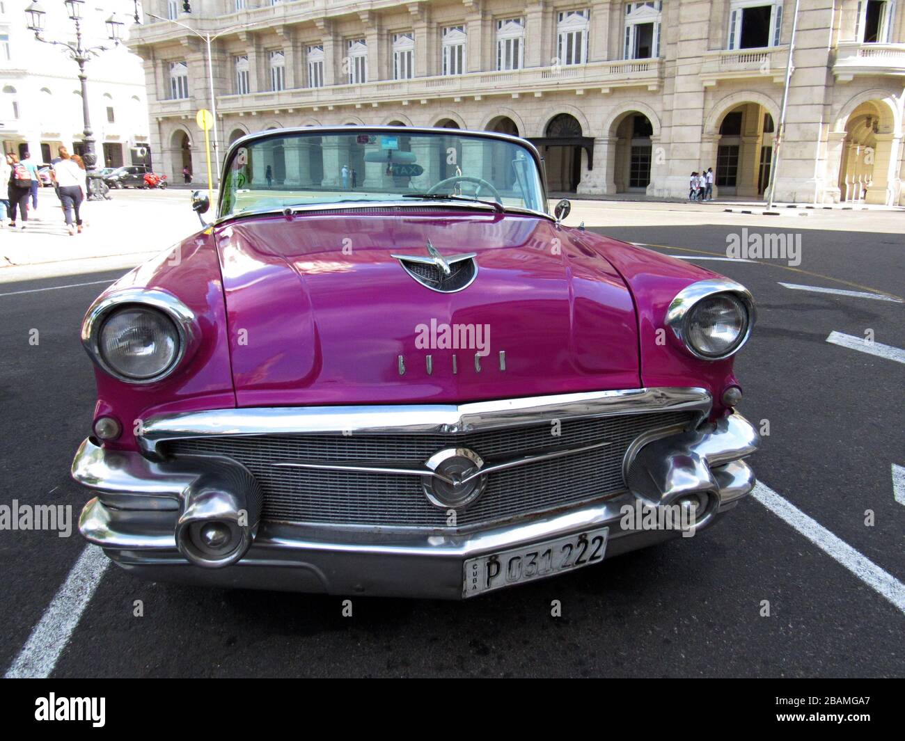 American convertible vintage cars parked on the main street in Cuba ...
