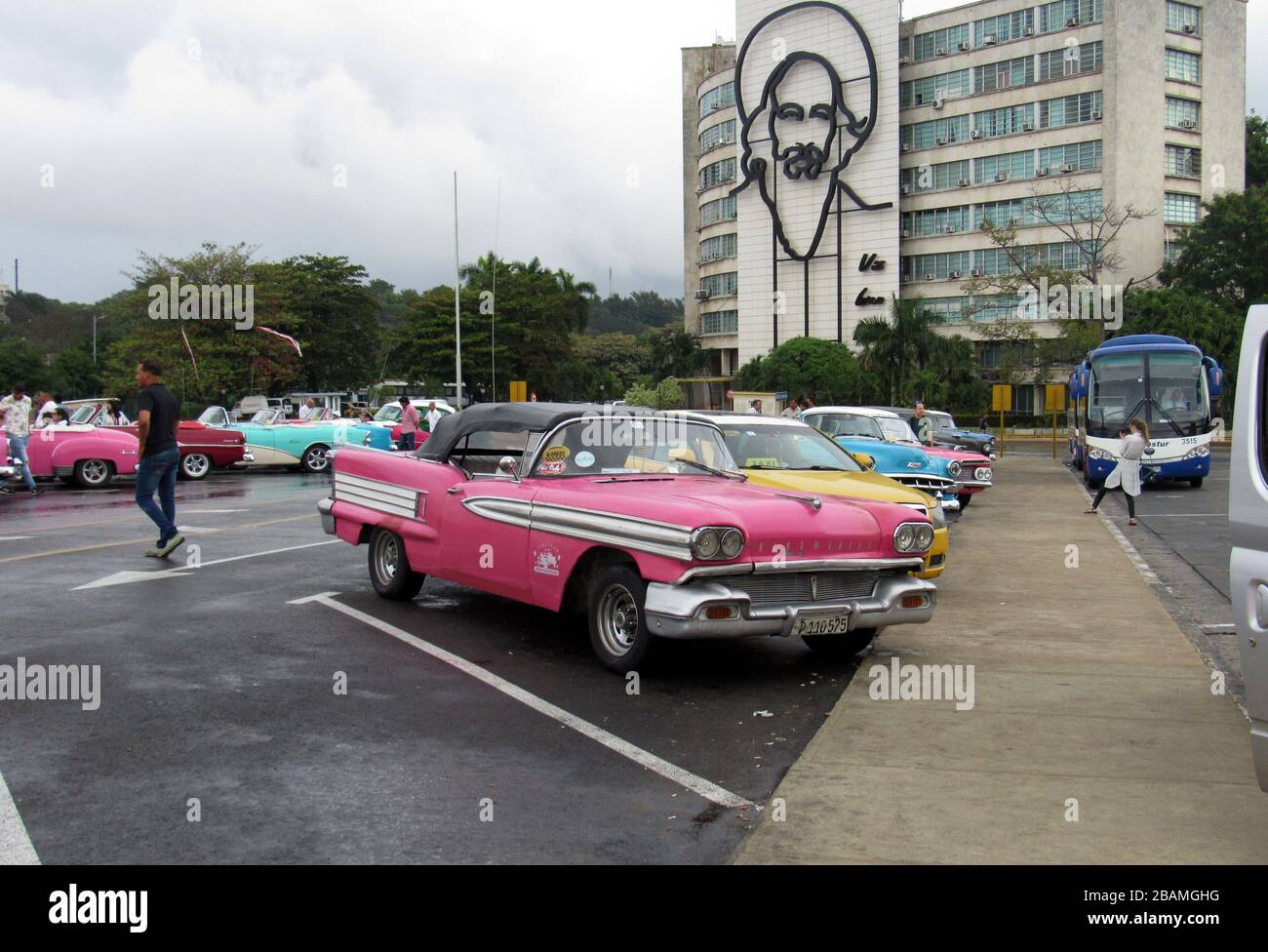 American convertible vintage cars parked on the main street in Cuba ...