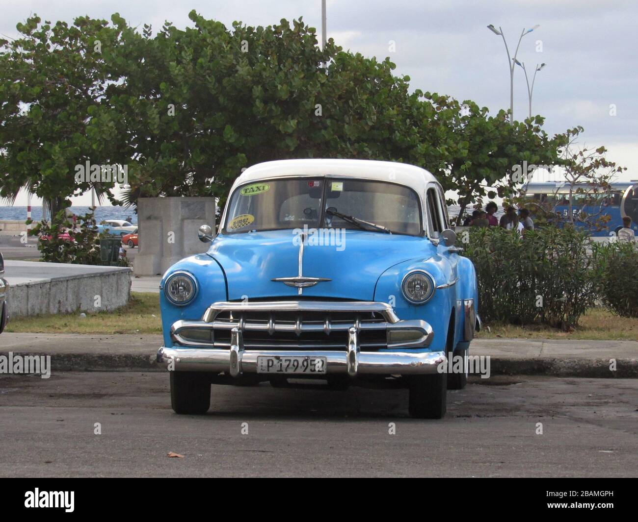 American convertible vintage cars parked on the main street in Cuba ...