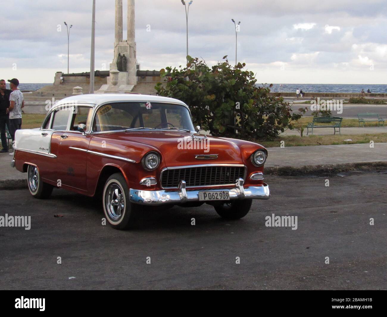 American convertible vintage cars parked on the main street in Cuba ...