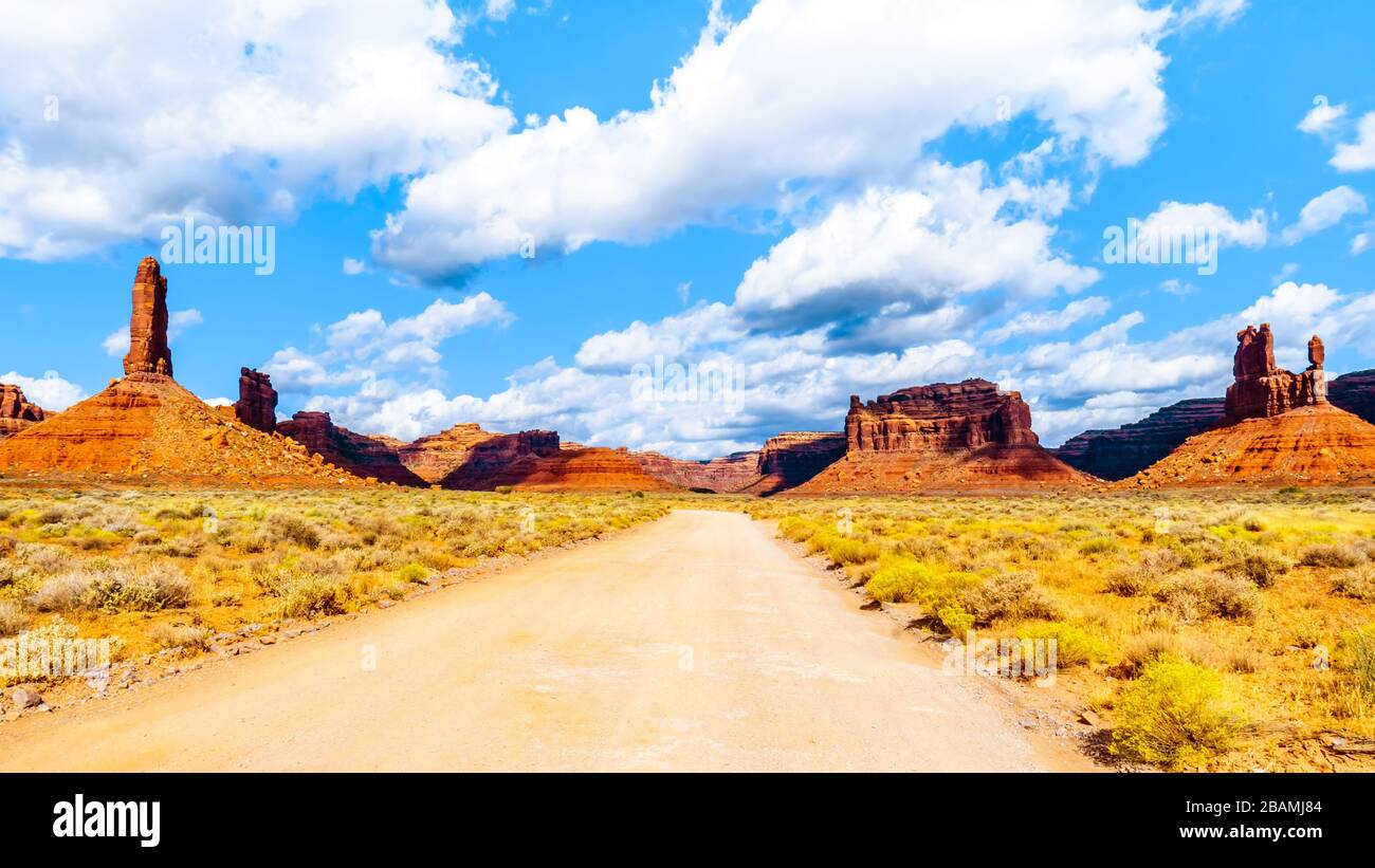 Gravel Road winding through the landscape of Red Sandstone Buttes and ...