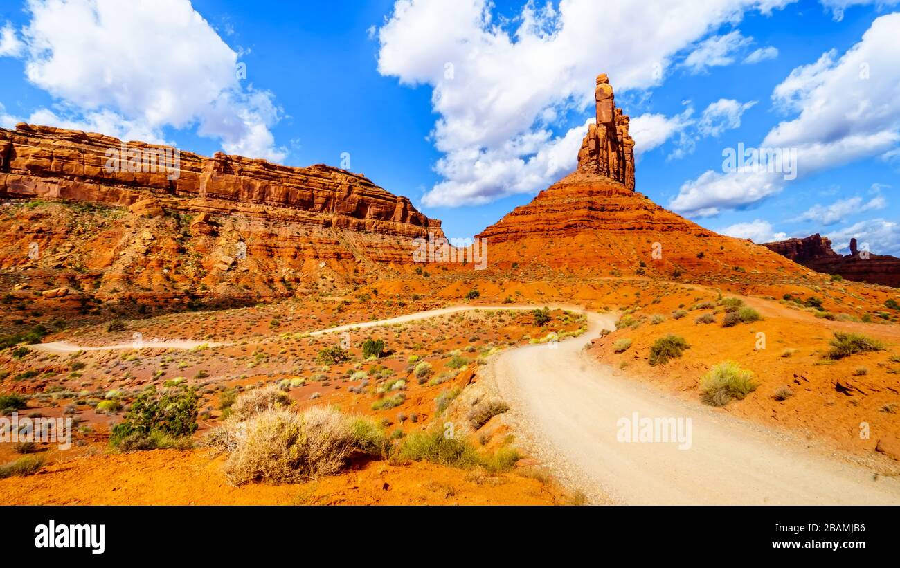 Gravel Road winding through the landscape of Red Sandstone Buttes and ...