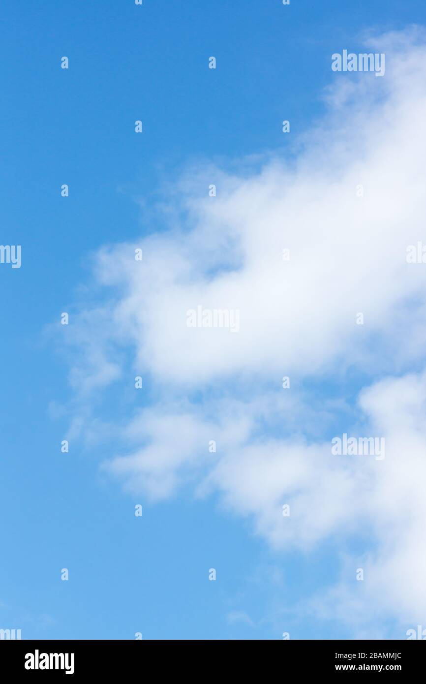 blue sky with flying white light clouds Stock Photo - Alamy