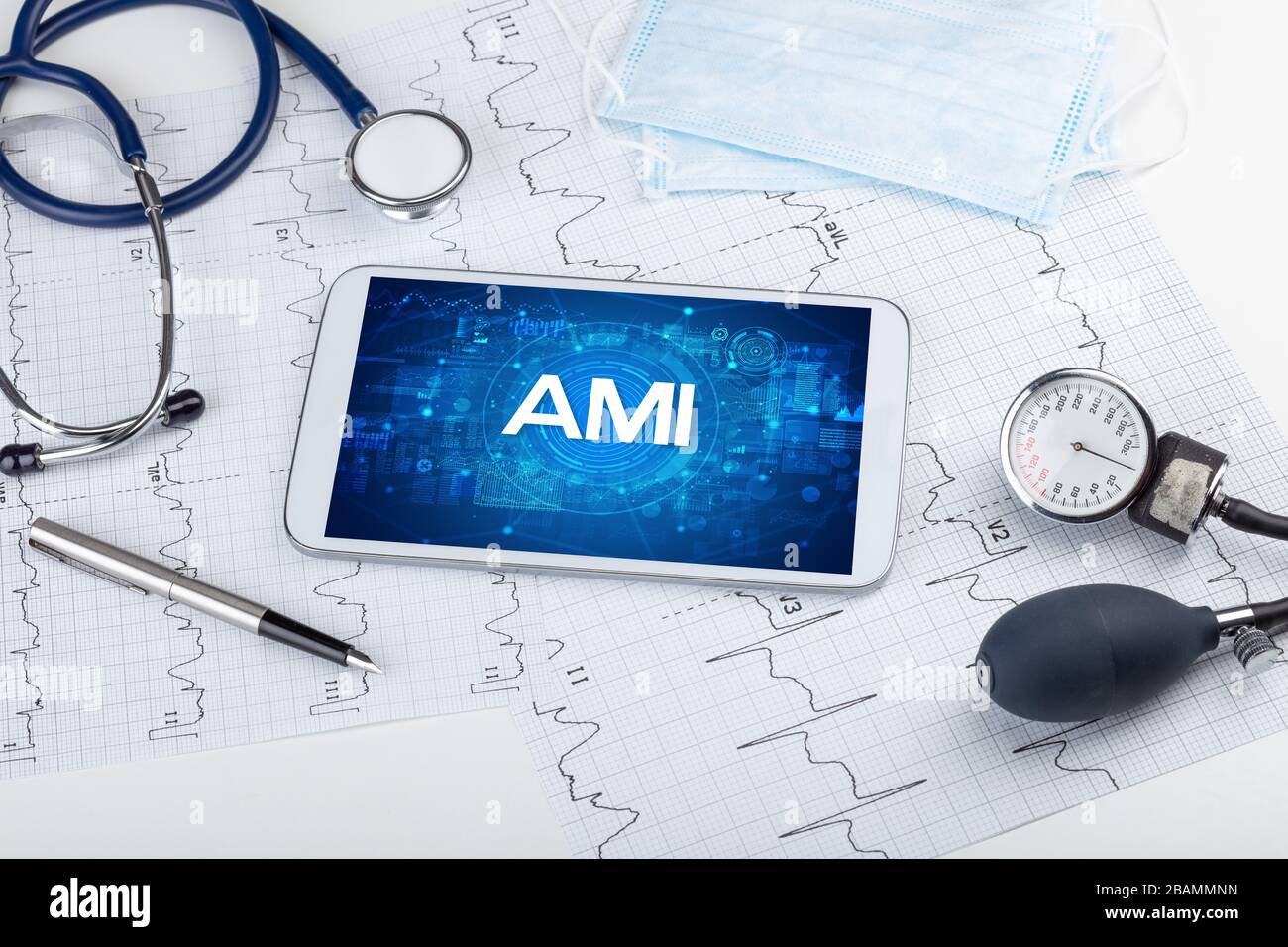 Close-up view of a tablet pc with AMI abbreviation, medical concept ...