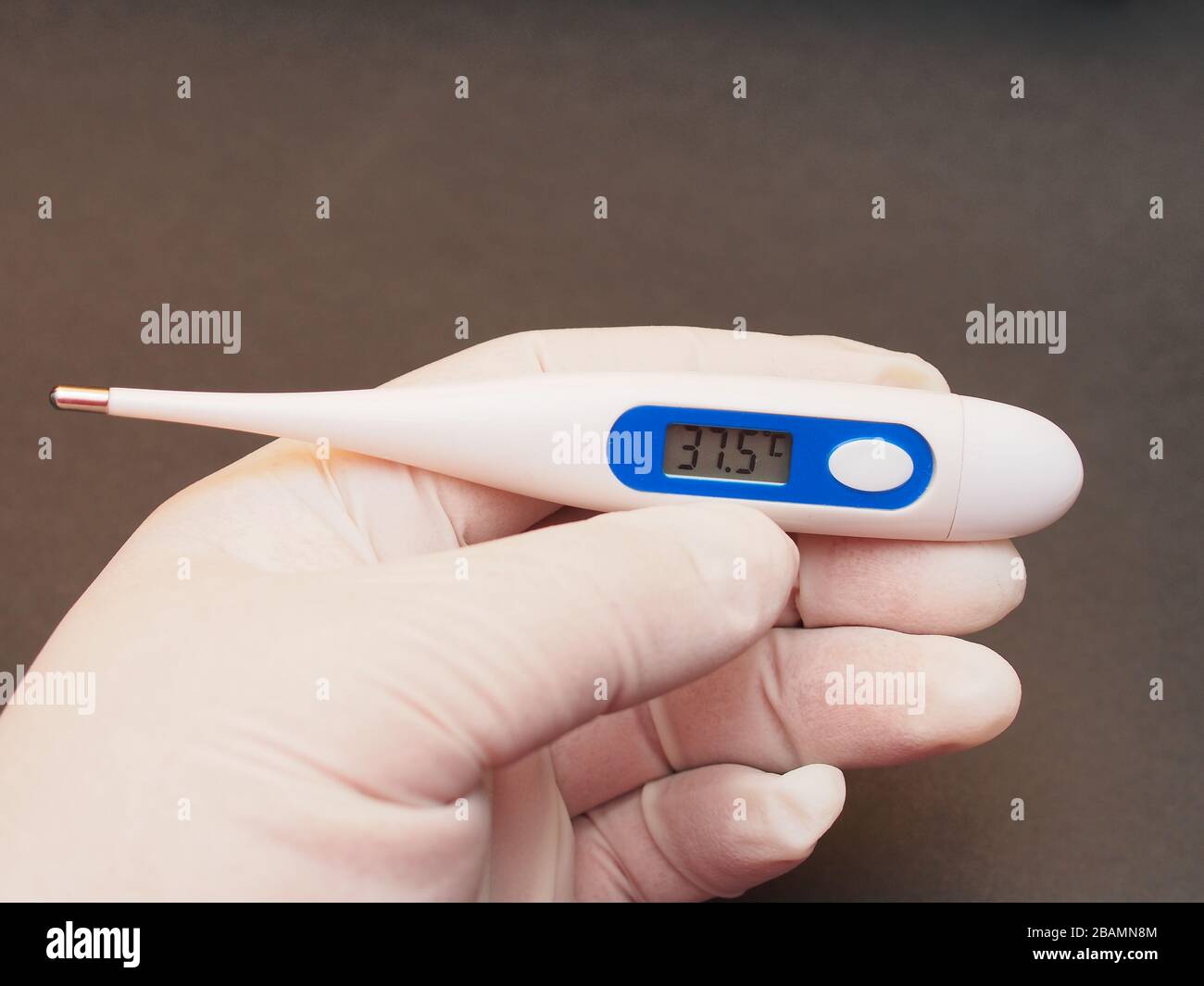 Subfebrile temperature. The display of the electronic thermometer shows ...