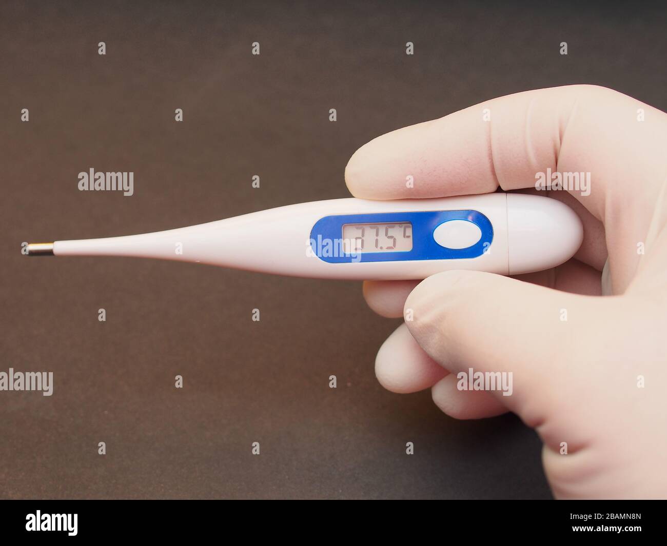 Subfebrile temperature. The display of the electronic thermometer shows ...