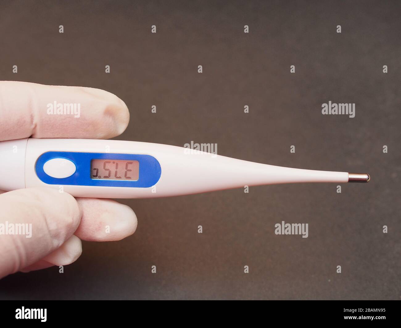 Subfebrile temperature. The display of the electronic thermometer shows ...