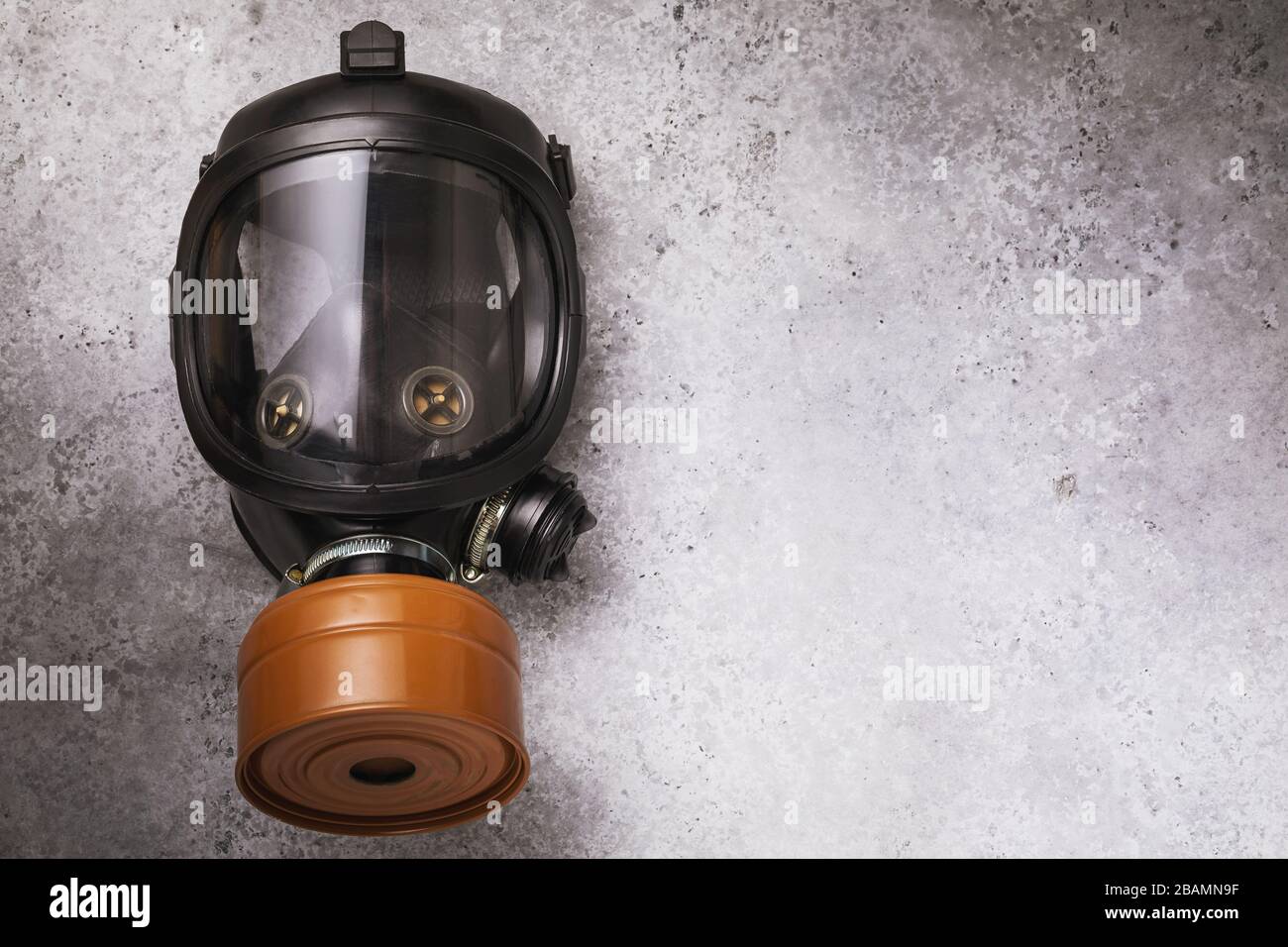 Gas mask on a table with copy space, top view Stock Photo - Alamy