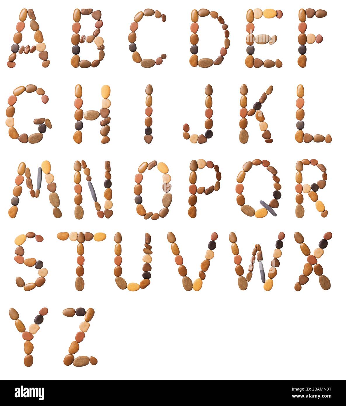 English alphabet made of sea small pebbles isolated on white background ...