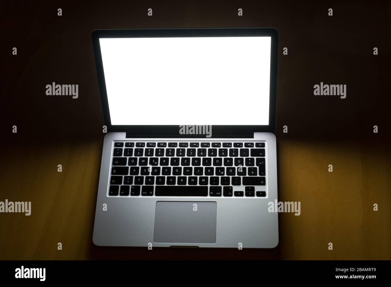 Laptop with glowing light hi-res stock photography and images - Alamy