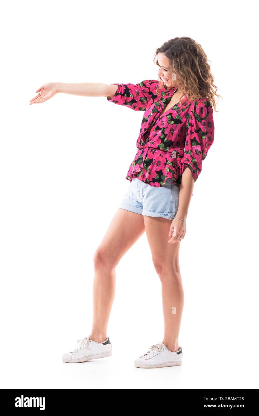 Side view of friendly caring young woman reaching and offering hand for ...