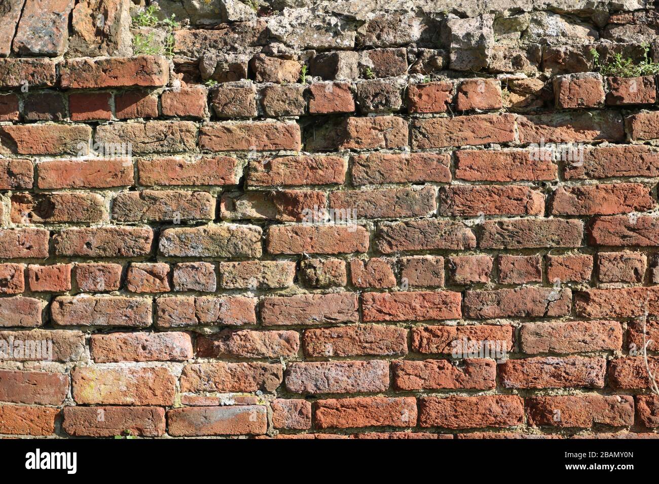 Historic weather worn Brick wall 23/07/20175 Harvington, England ...
