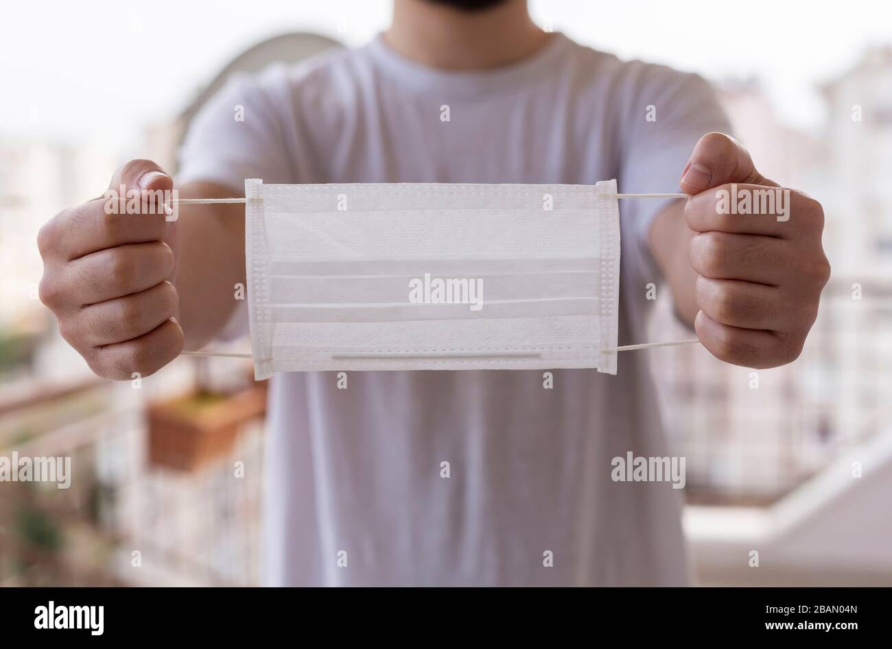 Cleaning by hanging the health mask Stock Photo - Alamy
