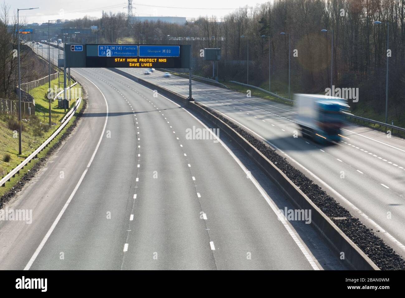 Glasgow, UK. 28th Mar, 2020. Pictured: Road signs all along the M8 and ...