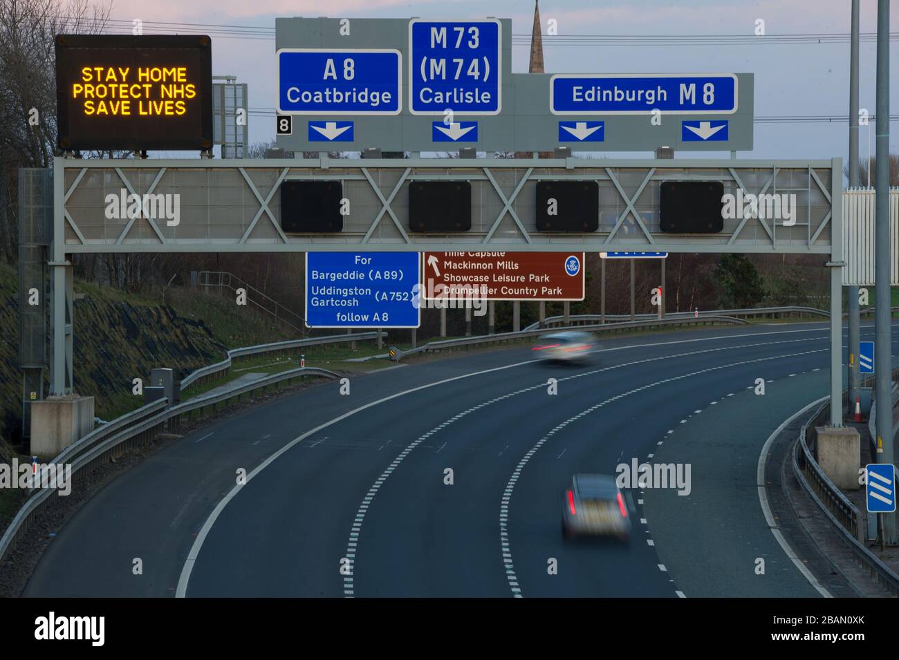 Glasgow, UK. 28th Mar, 2020. Pictured: Road signs all along the M8 and ...
