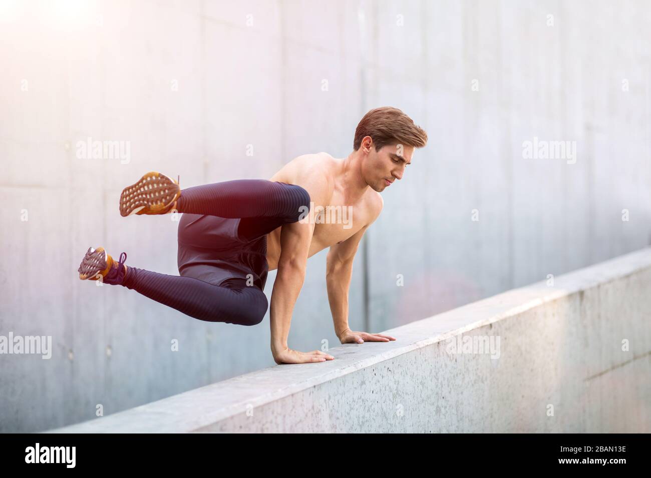 Young man running in gym hi-res stock photography and images - Alamy