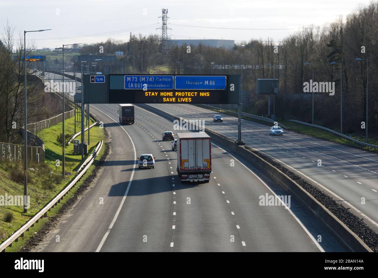 Motorway road sign showing turn off for m73 hi-res stock photography ...