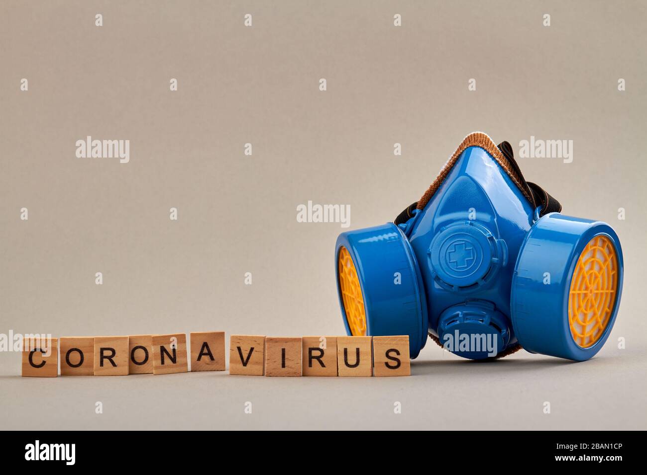 Respiratory half-mask isolated on beige background Stock Photo - Alamy