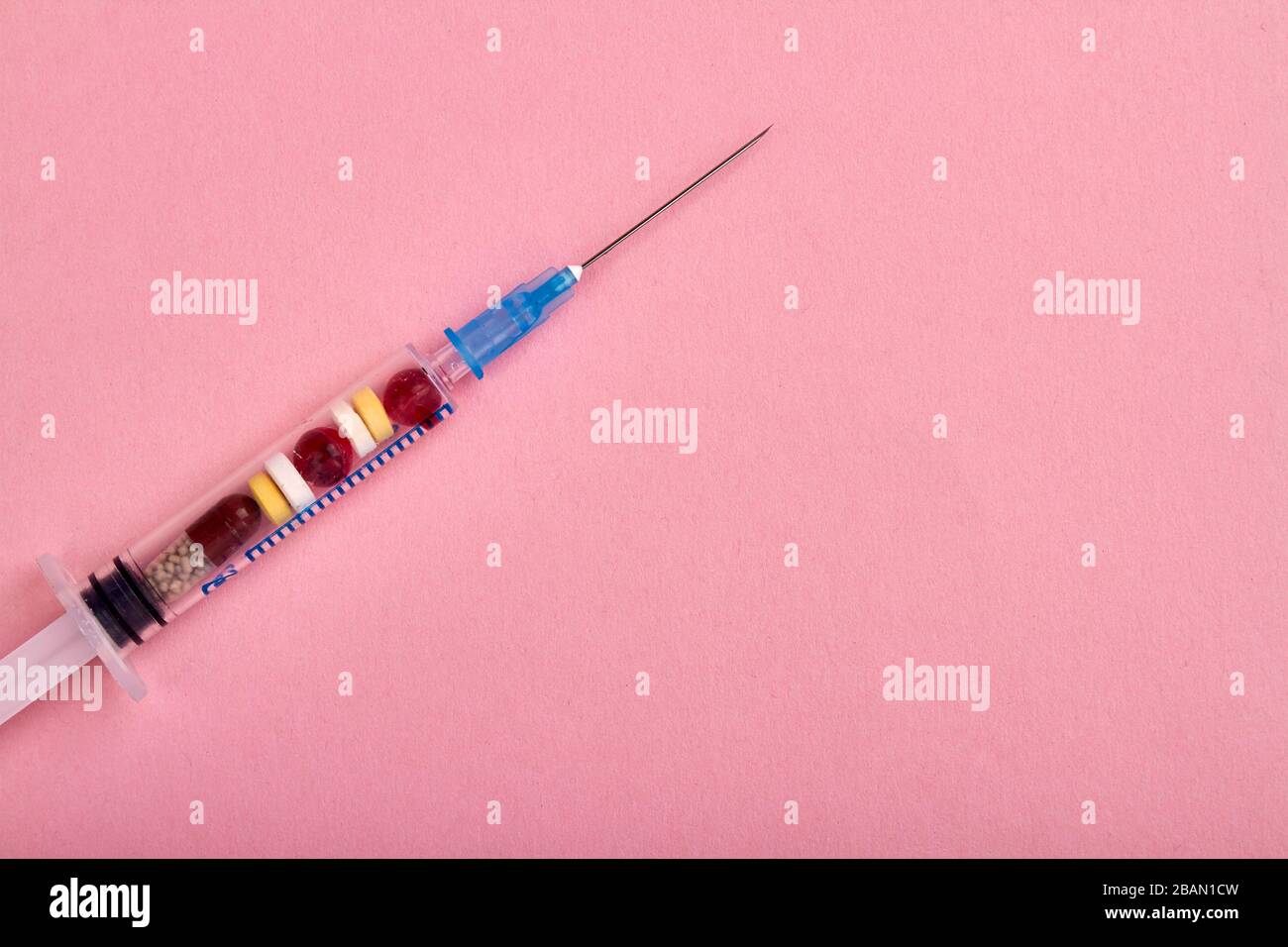 Syringe filled with pills and tablets hi-res stock photography and ...
