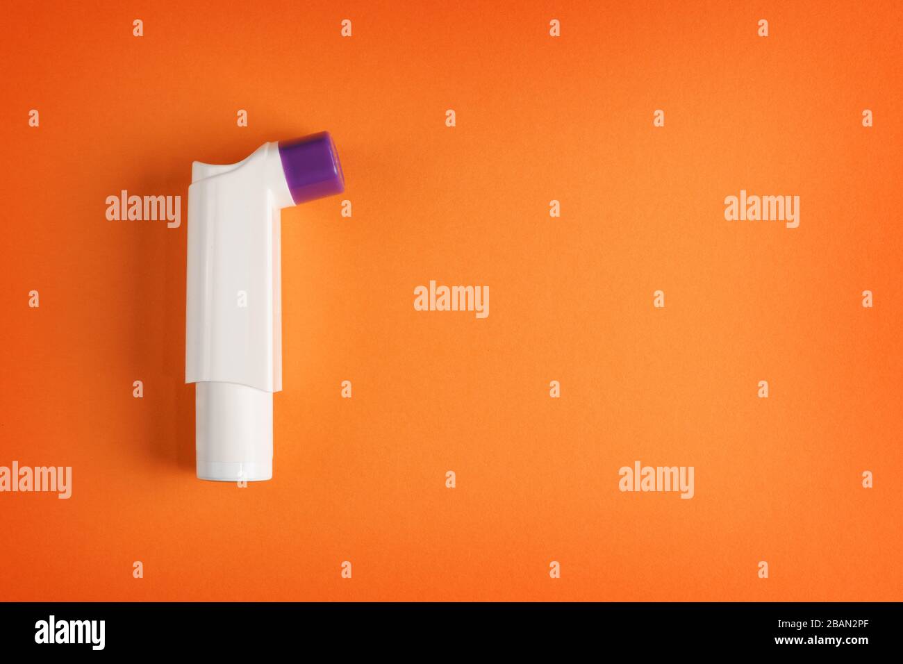Asthma inhaler on orange background with copy space. Flat lay Stock ...