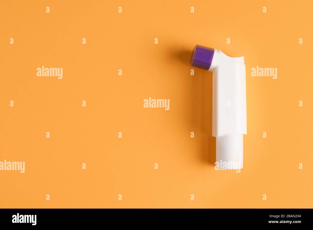 Asthma inhaler on yellow background with copy space. Flat lay Stock ...
