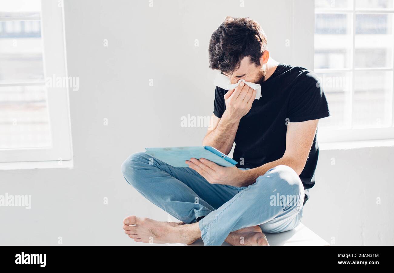 studio picture from a young man with handkerchief Stock Photo - Alamy
