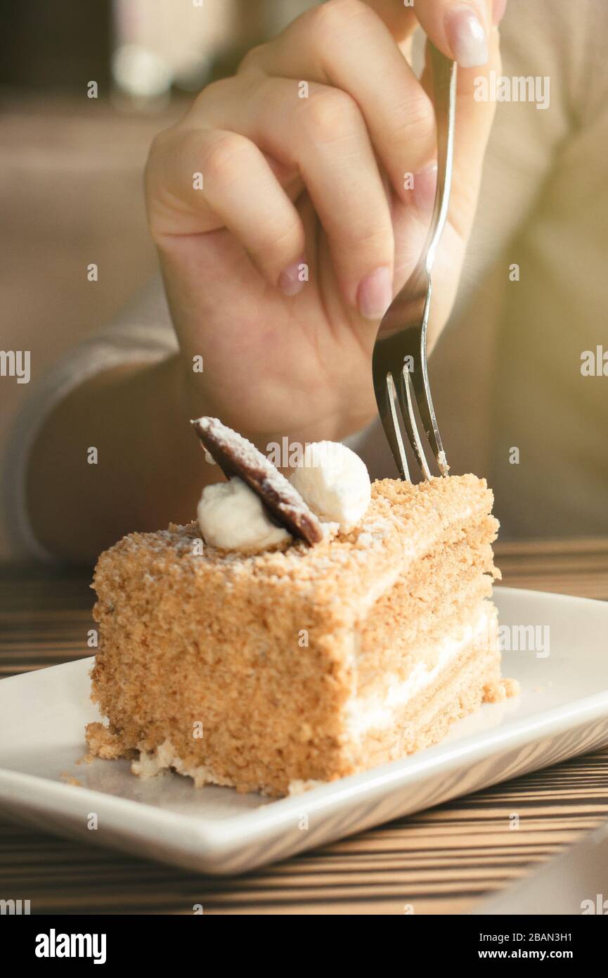 Female hand holding piece chocolate hi-res stock photography and images ...