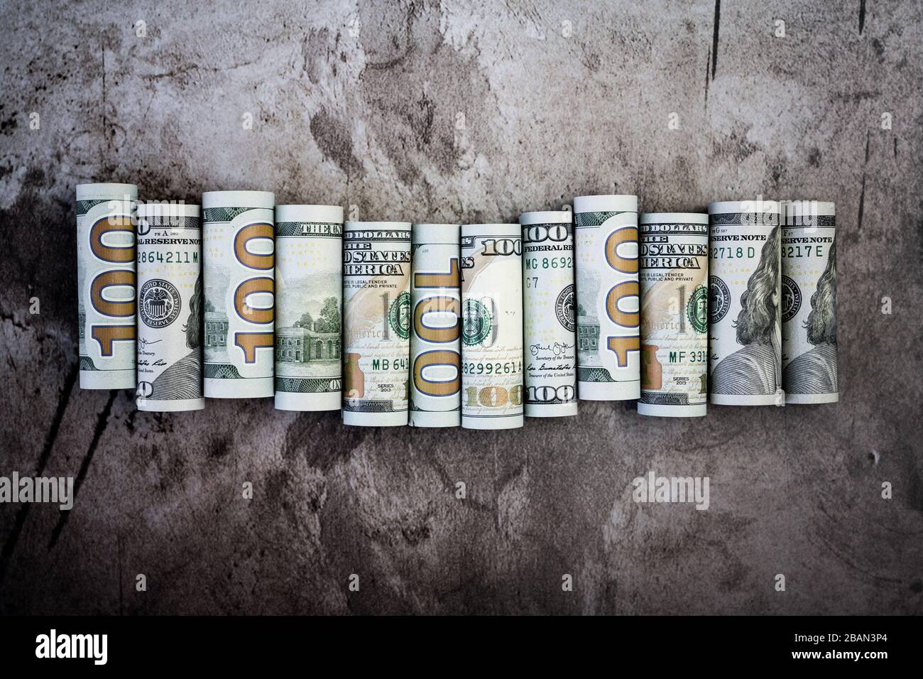 US dollar bills in rolls Stock Photo - Alamy