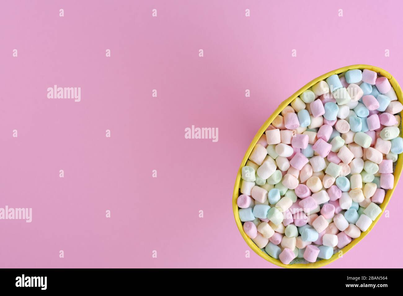 mini marshmallows in different colors in the shape of an easter egg on ...