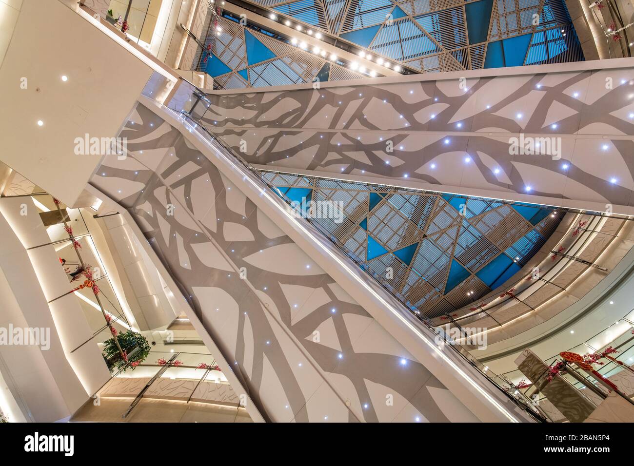 Subtle lighting and intricate designs under the escalators in the IFC ...