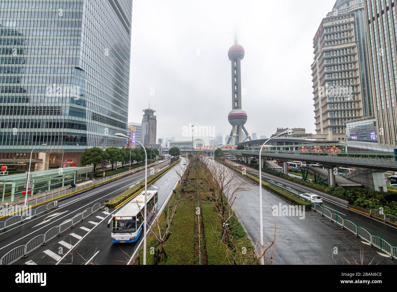 An empty street amongst the tall buildings in Shanghai, China Stock ...