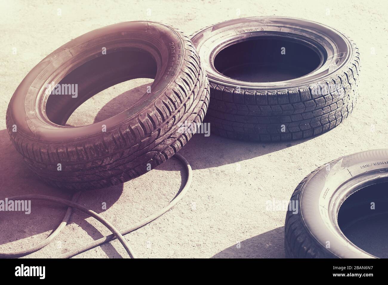 A car wheel tires lying on a ground Stock Photo - Alamy