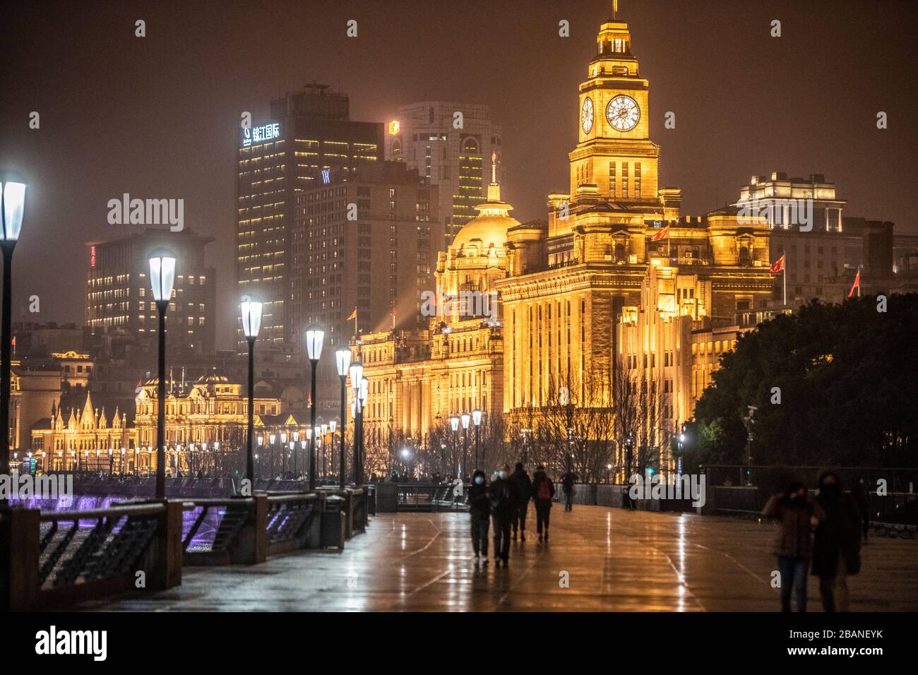 The bright lights from the Bund illuminating the surrounding area ...
