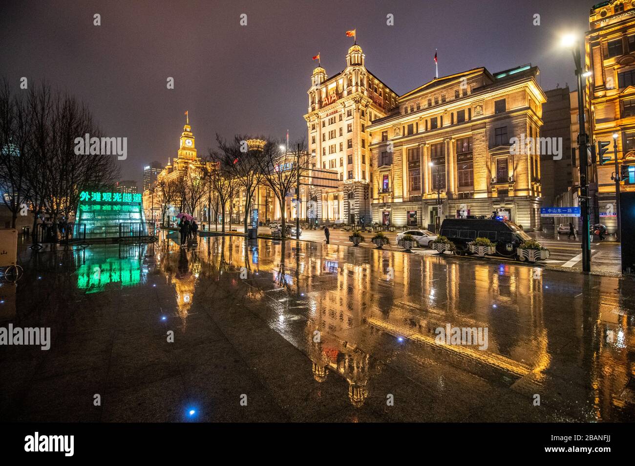 The bright lights from the Bund illuminating the surrounding area ...
