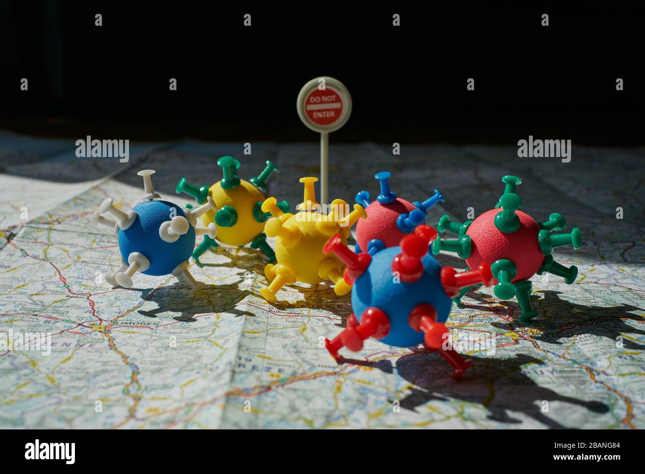 virus models stop at a stop sign on a map Stock Photo - Alamy