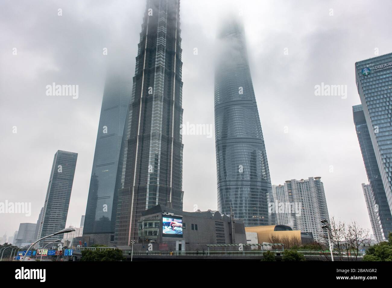 Towering buildings stretching into the clouds , Shanghai, China Stock ...