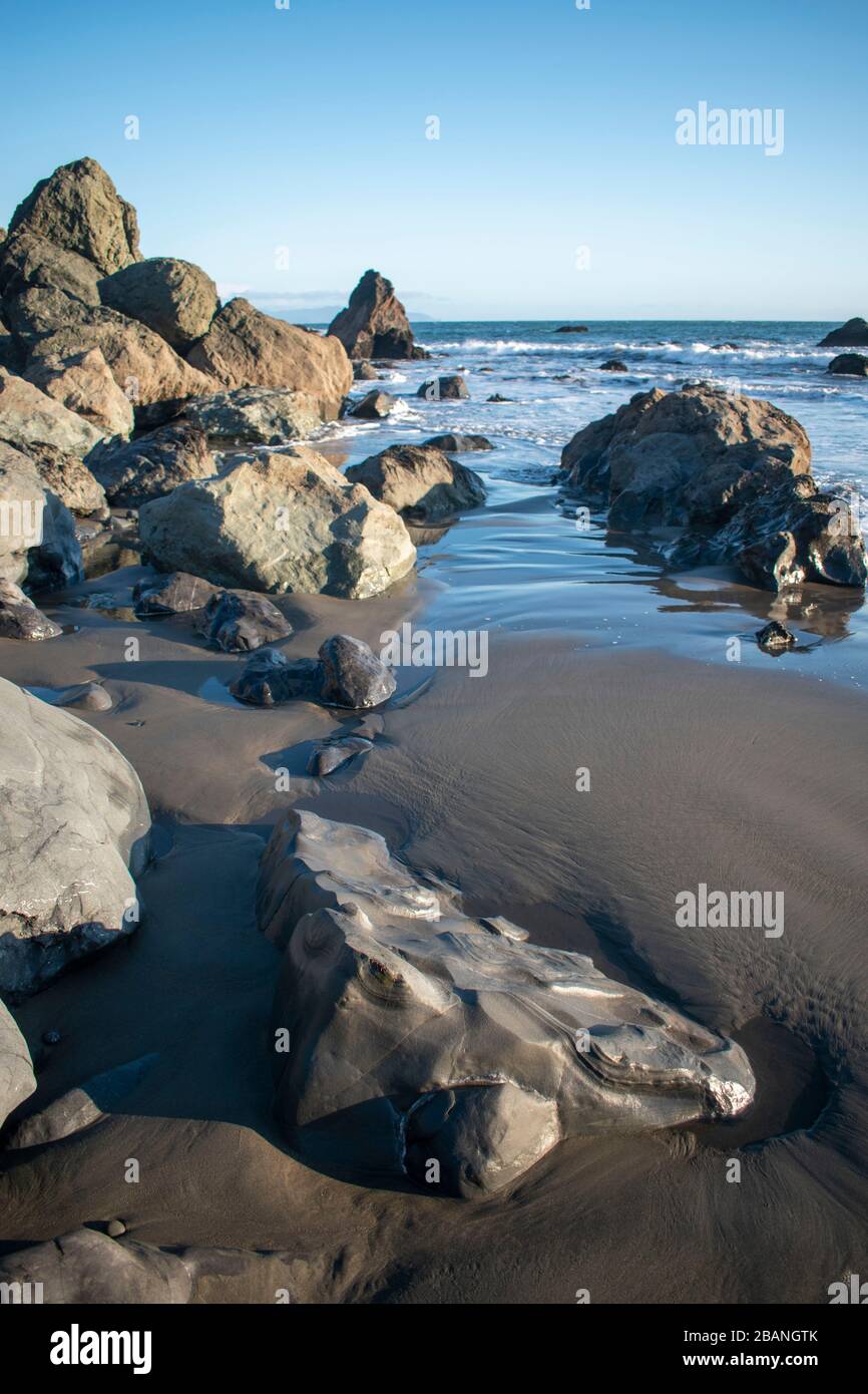 The rocks at Muir Beach in Marin County have interesting textures Stock ...
