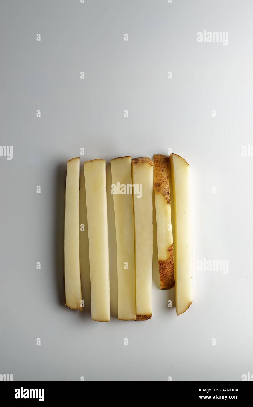 Fresh cut potatoes Stock Photo - Alamy